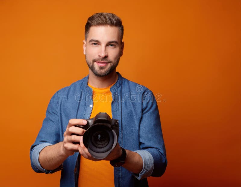 A Creative Male Content Creator in a Casual Outfit, Holding a Camera ...
