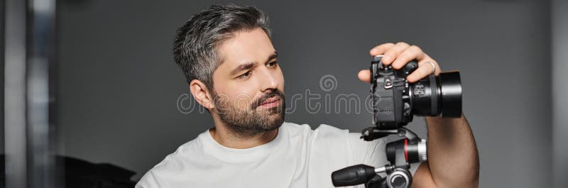 Creative Man Capturing Moments with Camera Stock Photo - Image of ...