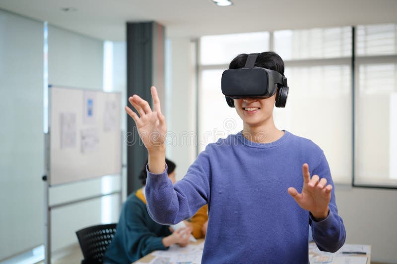 Creative Man Developers Testing Virtual Reality Simulator Glasses at ...