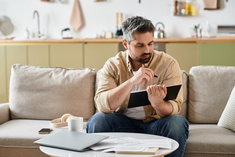 Creative Man Engaged in Thoughtful Note Stock Photo - Image of laptop ...