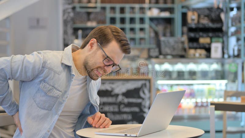 Creative Man Having Back Pain while Working on Laptop Stock Image ...