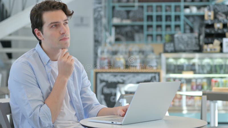 Creative Man with Laptop Thinking in Cafe Stock Photo - Image of laptop ...