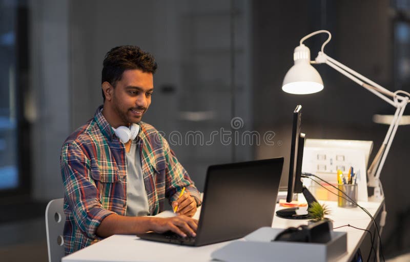 Creative Man with Laptop Working at Night Office Stock Photo - Image of ...