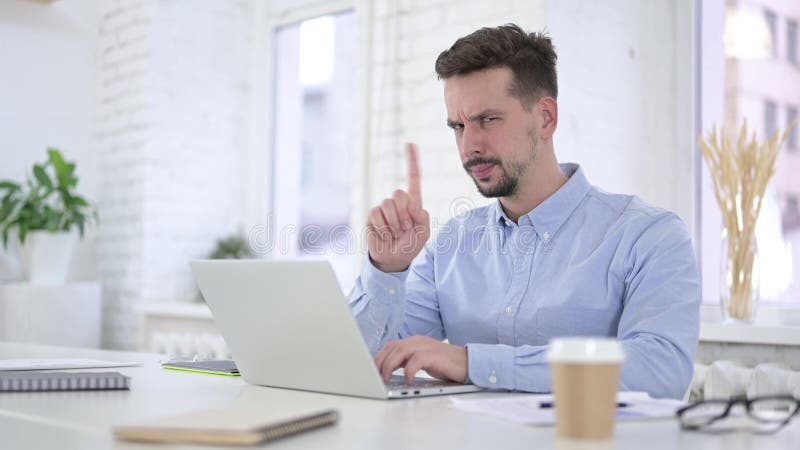 Creative Man Saying No with Finger Sign at Work Stock Image - Image of ...