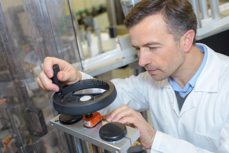 Creative Mechanical Engineer Working on Machines Stock Image - Image of ...