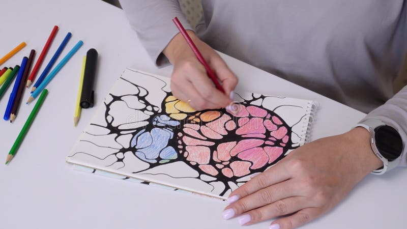 Creative Mindfulness: Woman Colouring Detailed Brain Pattern with Gel ...