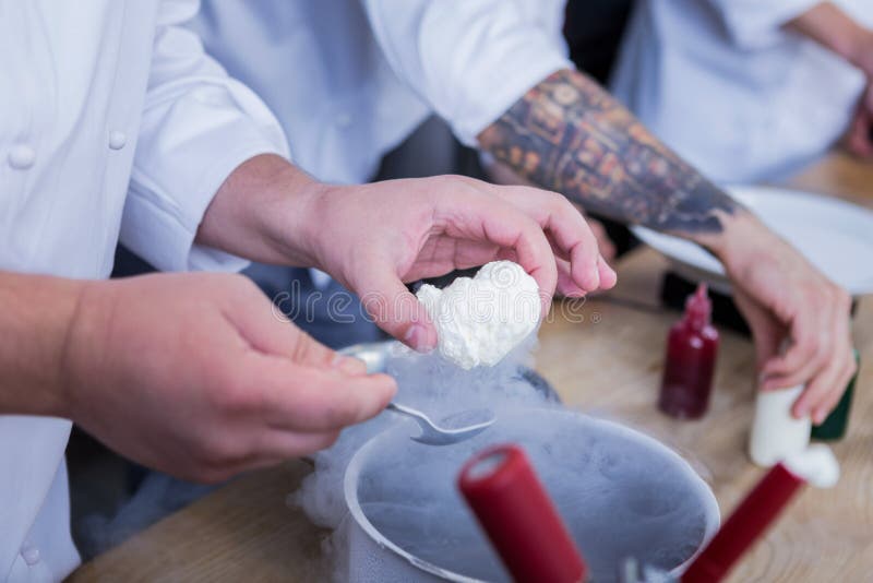 Creative Modern Cooks Providing Different Innovative Technologies Stock ...