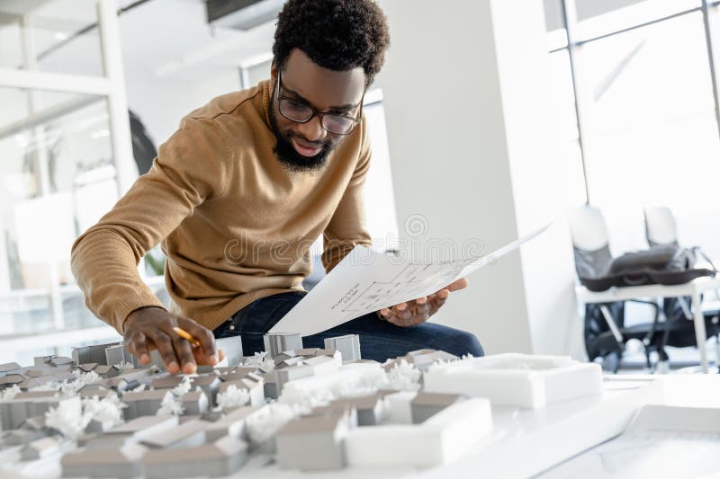 Architect Feeling Creative while Making Some Changes in a Mockup Stock ...