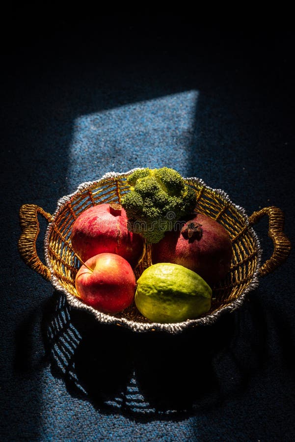 Creative Moody Shot of Fruit and Vegitable in a Golden Basket Stock ...