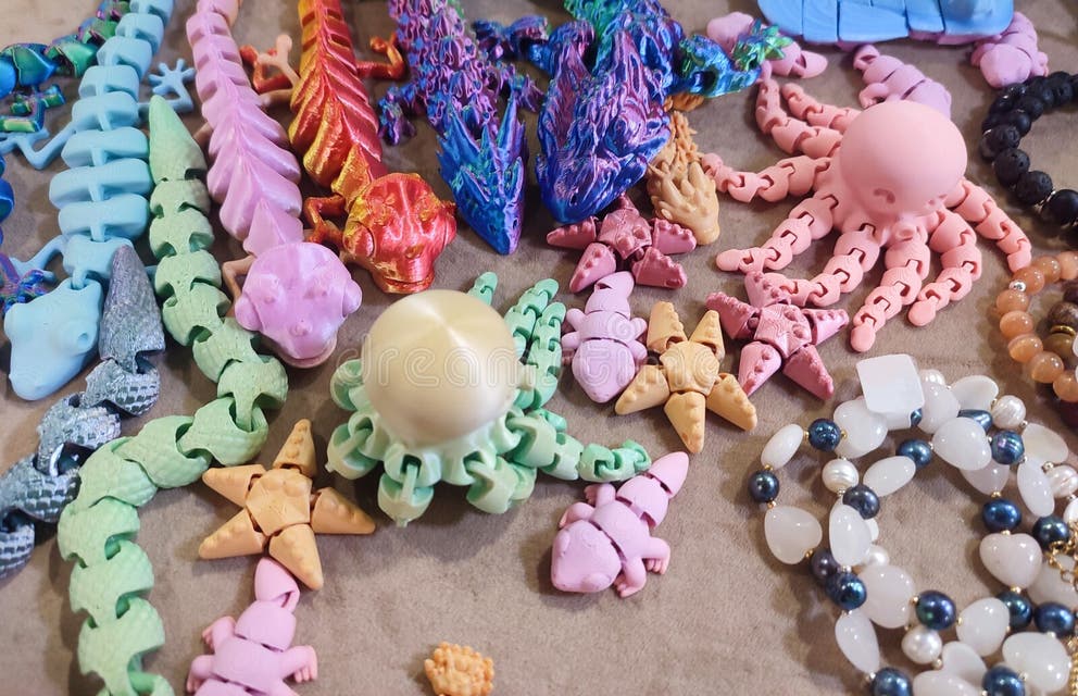 Creative Multi-colored Models Printed on 3D Printer from Molten Plastic ...