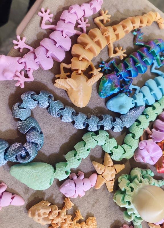 Creative Multi-colored Models Printed on 3D Printer from Molten Plastic ...
