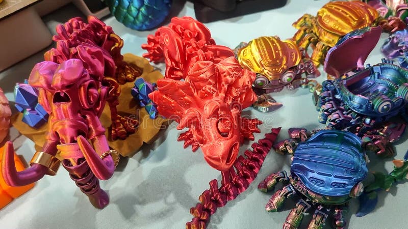 Creative Multi-colored Models Printed on 3D Printer from Molten Plastic ...