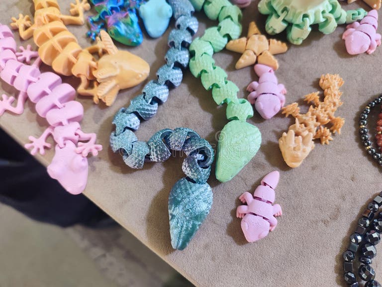 Creative Multi-colored Models Printed on 3D Printer from Molten Plastic ...