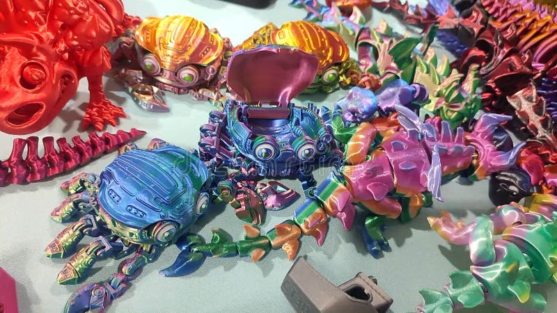 Creative Multi-colored Models Printed on 3D Printer from Molten Plastic ...