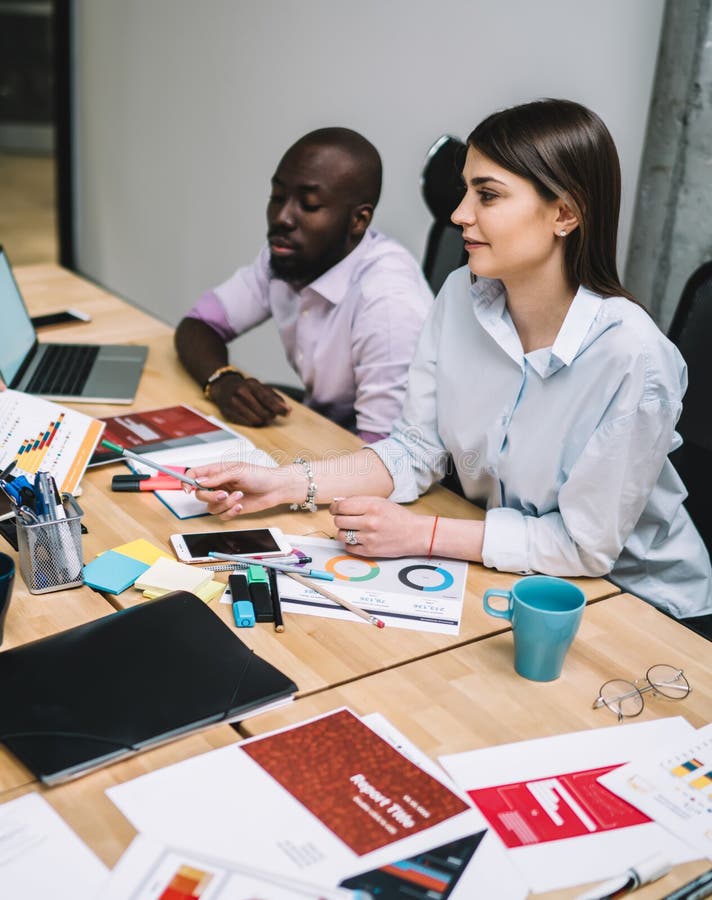Creative Multiethnic Students Arguing Documents Together at Office Stock Photo - Image of ...