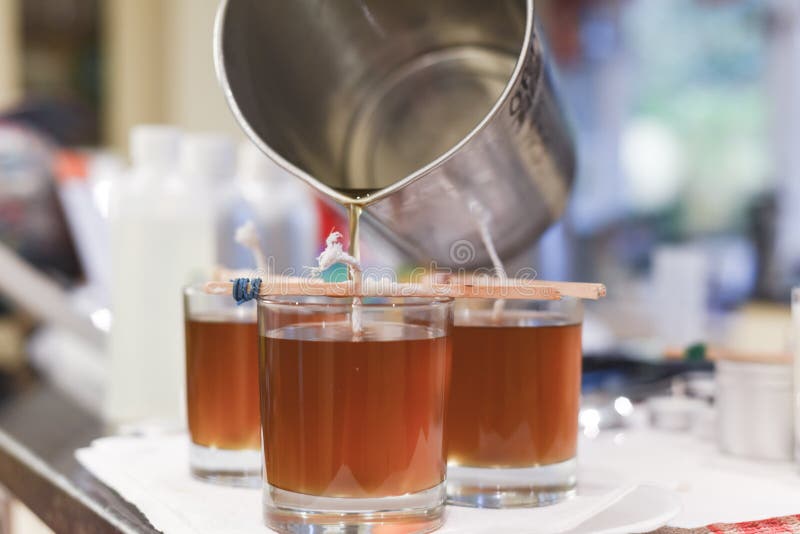 Creative Occupation of Candle Making Showing the Pouring of Liquid Wax ...