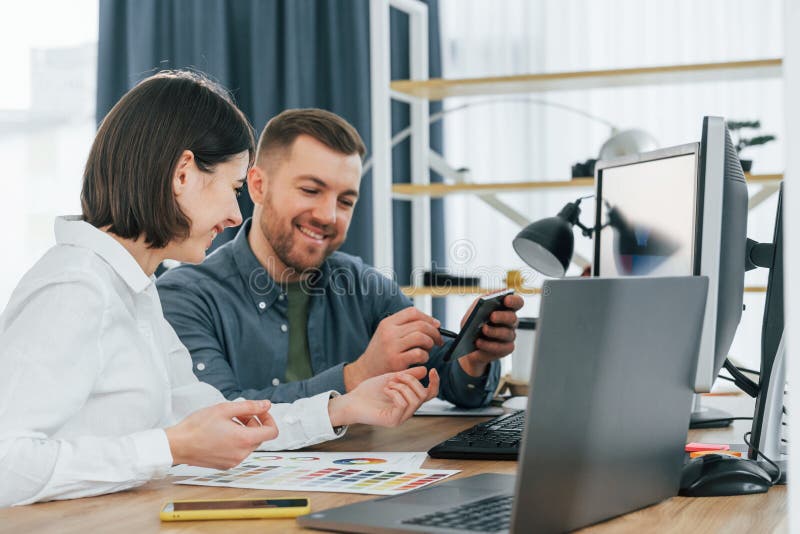 Creative Occupation. Two Designers Working Together in the Office Stock ...