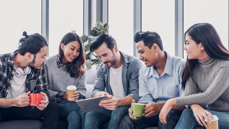 Creative Office,Designer Team Use Tablet in Casual Meeting at Sofa and ...