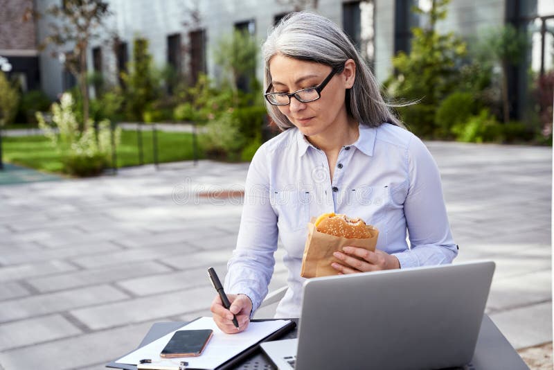 Creative Office Worker Multitasking Outdoors in Open Air Stock Photo ...