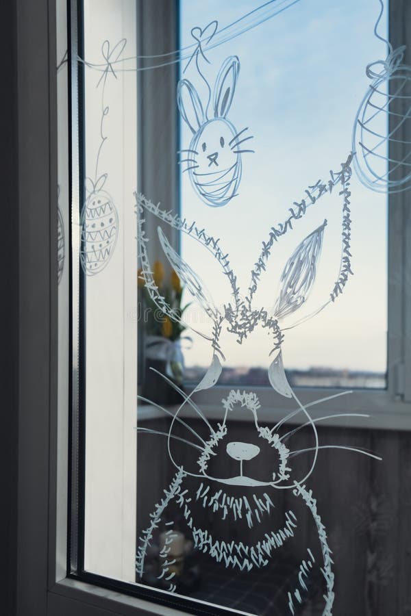 Creative Painting on Window with White Marker. Easter Bunny Rabbit ...