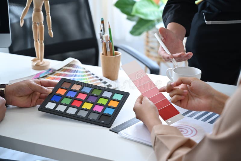 Creative People Using Color Swatches and Working in Design Studio ...