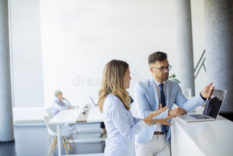 Creative People Working on a Laptop at Startup Office Stock Image ...