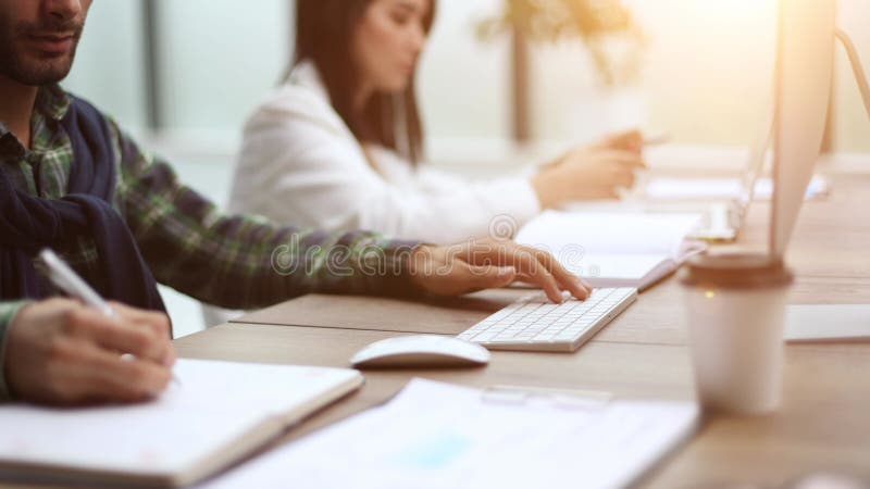 Creative Performer. Young People Working at the Computer while Sitting ...