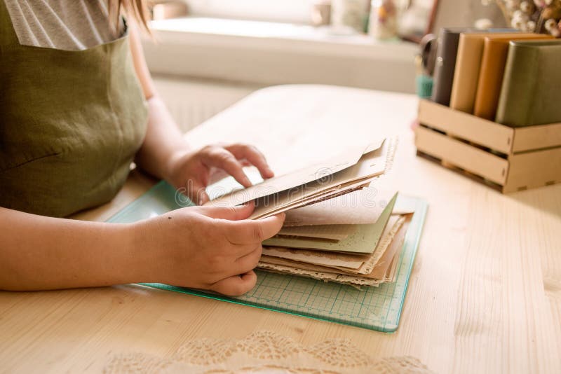 A Creative Person Makes a Scrapbook or Notebook in Their Office Stock ...