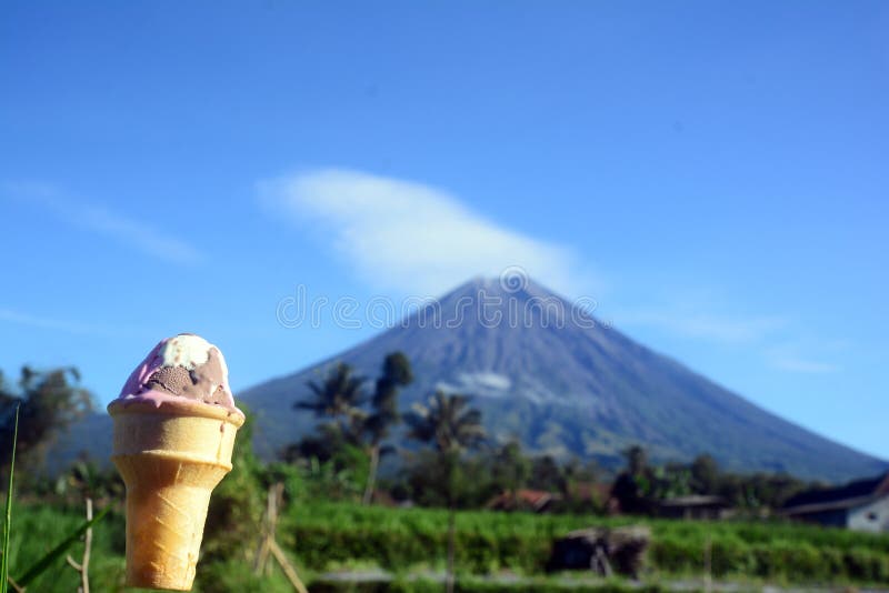 Ice Cream Cone with Volcano in Background Under Clear Blue Sky Stock ...