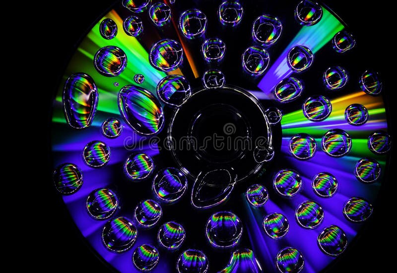 Creative Photo with a CD with Great Lights and Waterdrops on the ...