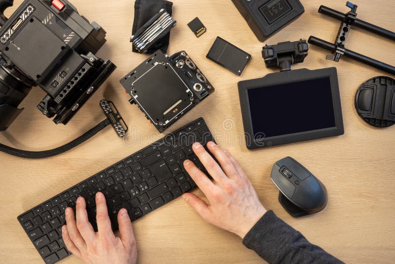 Creative Photographer Using Computer Keyboard by Filming Equipment at ...