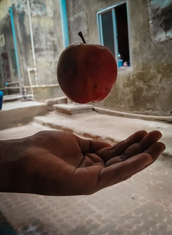 Apple floating in the air stock photo. Image of flying - 167717546