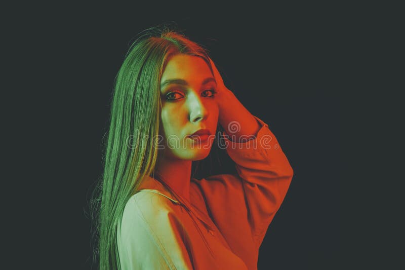 Portrait of a Beautiful Female Model Close-up. Orange and Green ...