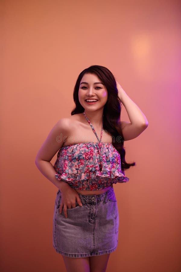 Creative Portrait of a Beautiful Model in the Studio in the Mix Light ...