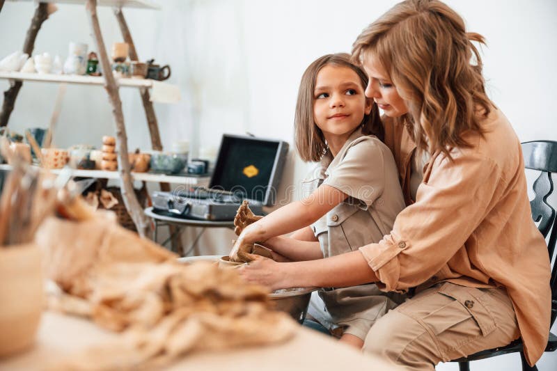 Creative Process. Mother with Little Girl Doing Pottery at Home Stock ...