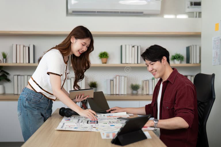 UX UI Design Collaboration. Young Professionals Organizing Ideas on a ...