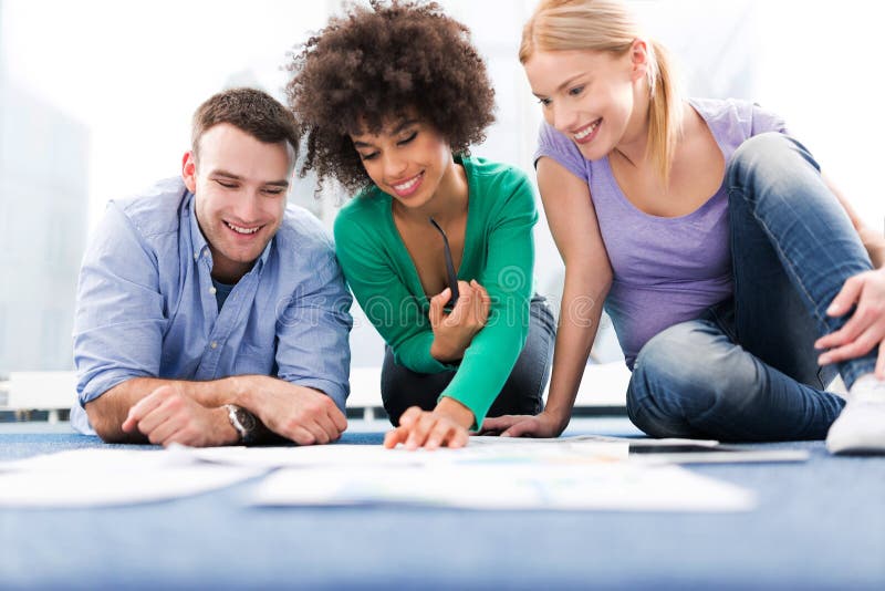 Creative Professionals Working on Floor Stock Image - Image of ...