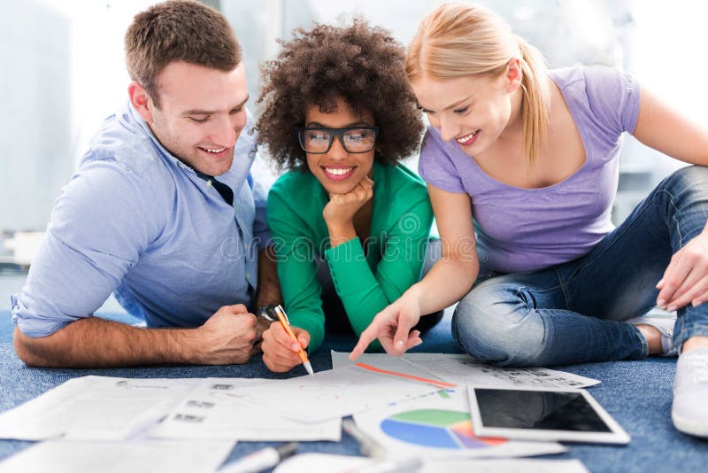 Creative Professionals Collaborating on Business Ideas in a City ...