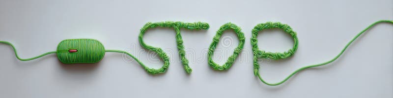 Creative Representation of the Word Stop Using Green Yarn and a Mouse ...