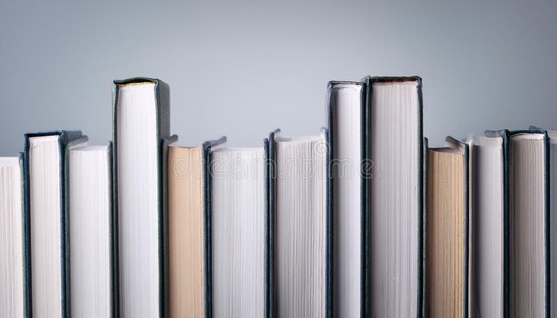 Creative Row of Stacked White Books on Gray Background. Library ...