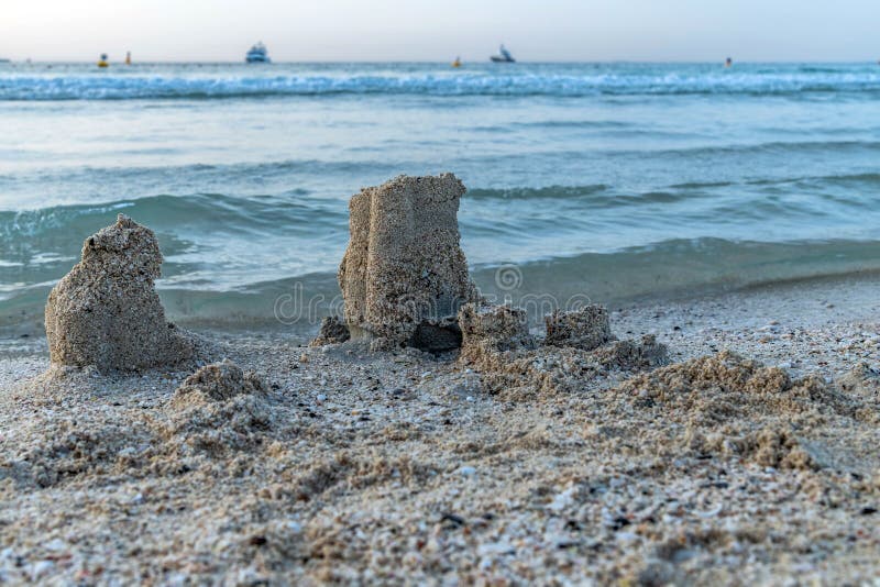 Sand Castle at sandy beach stock image. Image of coast - 146125991