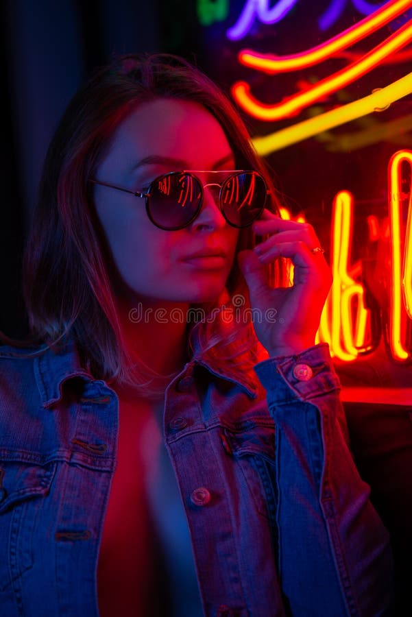 Creative Sexual Portrait Of A Girl In Neon Lighting With Glasses Night Party Dancing Game