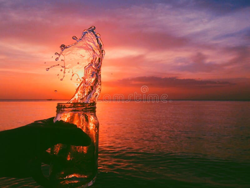 Creative Shot sunset stock image. Image of water, bottle - 89757335