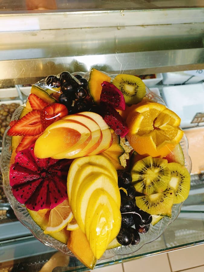 Creative sliced fruits stock image. Image of cuisine - 269884015