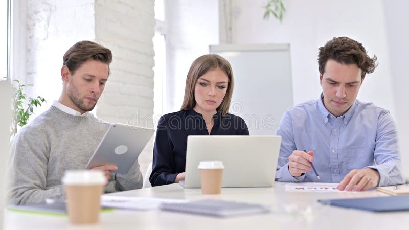 The Creative Startup Team Working on Digital Devices and Documents ...