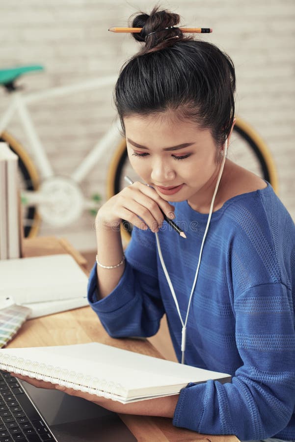 Creative Student Working on a Pencil Drawing in a Classroom Generated ...