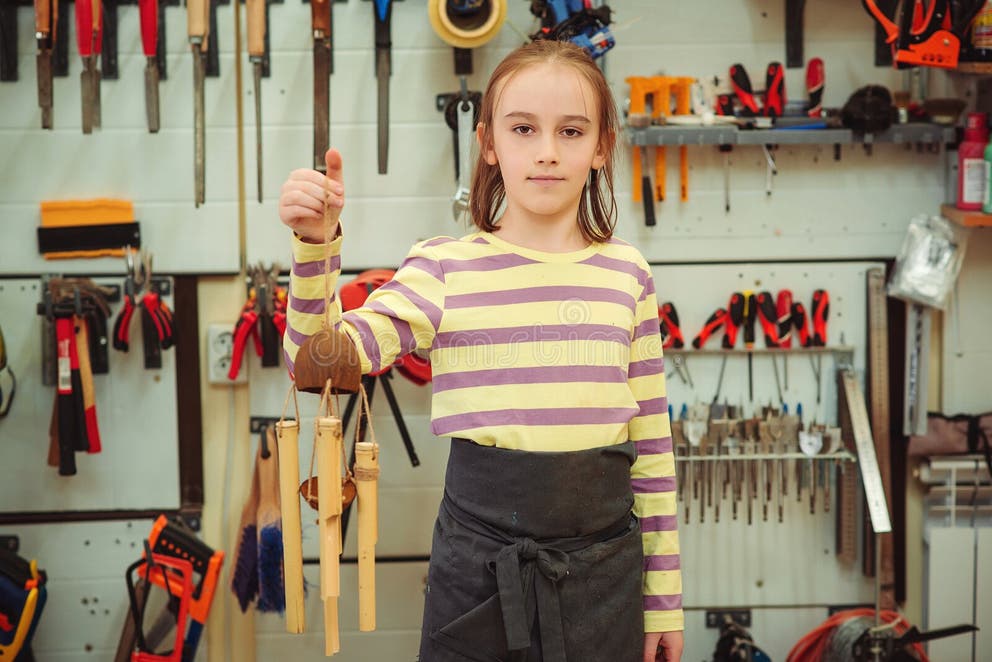Creative Student Doing His Project in Workshop. Boy in the Workshop Makes Crafts with Coconut ...