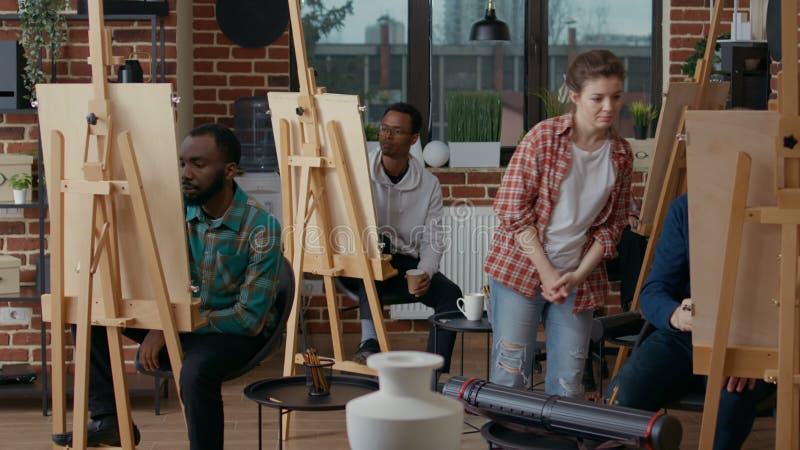 Creative Students Working on Multimedia Technology on Sofa or Lounge at ...