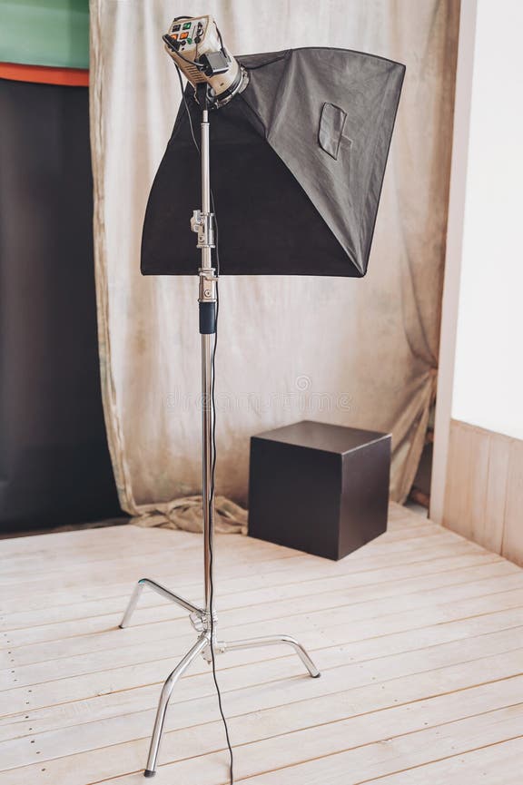 Creative Studio Setup Featuring a Professional Lighting Stand Designed ...