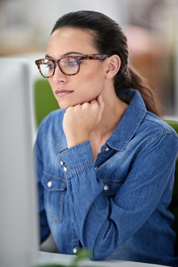 Creative Talent at Work. Businesswoman Working at Her Desk, Looking Thoughtfully at His Computer ...